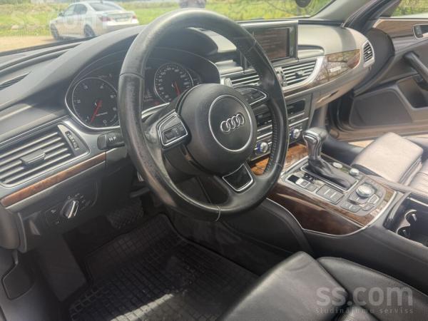Black Audi Allroad 2012 in Ogre, with an engine capacity of 3.00 L and mileage of 312 thousand km for 10900 €, photo 8 on AUTOMOTO.COM.LV