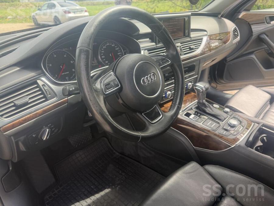 Black Audi Allroad 2012 in Ogre, with an engine capacity of 3.00 L and mileage of 312 thousand km for 10900 €, photo 9 on AUTOMOTO.COM.LV
