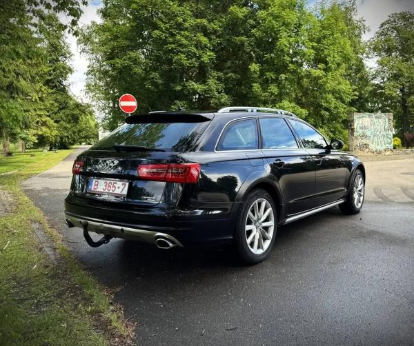 Black Audi Allroad 2012 in Jurmala, with an engine capacity of 3.00 L and mileage of 301 thousand km for 11900 €, photo 6 on AUTOMOTO.COM.LV