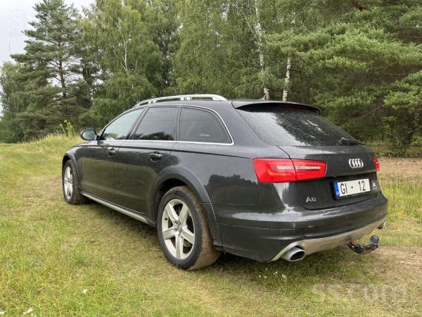 Melns Audi Allroad 2013 Rīga, ar dzinēja tilpumu 3.00 L un nobraukumu 576 tūkst. km par 7500 €, foto 3 vietnē AUTOMOTO.COM.LV