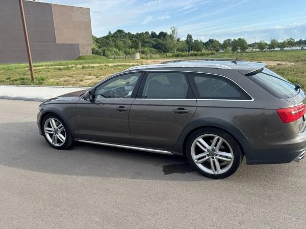 Grey Audi Allroad 2013 in Rezekne, with an engine capacity of 3.00 L and mileage of 234 thousand km for 14500 €, photo 8 on AUTOMOTO.COM.LV