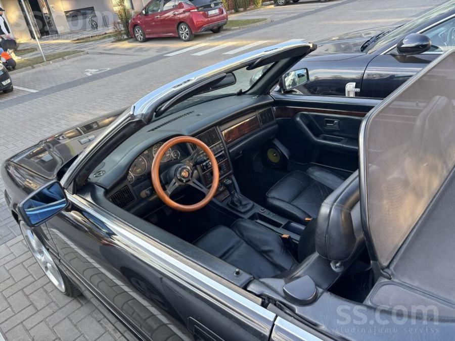 Black Audi Cabriolet 1992 in Riga, with an engine capacity of 2.30 L and mileage of 155 thousand km for 5000 €, photo 4 on AUTOMOTO.COM.LV