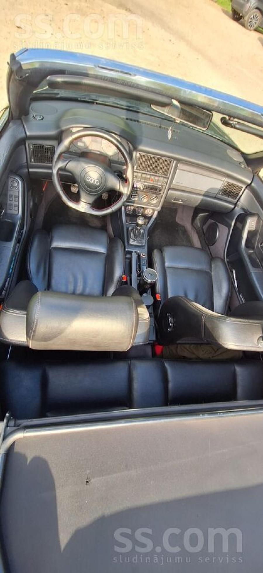 Black Audi Cabriolet 1998 in Riga, with an engine capacity of 2.60 L and mileage of 270 thousand km for 4900 €, photo 8 on AUTOMOTO.COM.LV