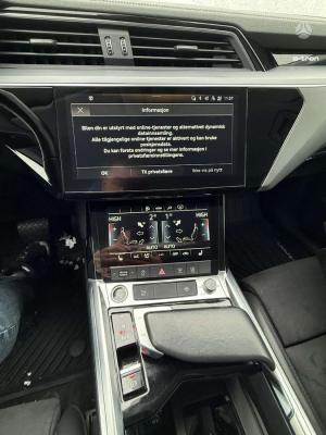 Black Audi E-Tron 2022 in Marijampole, with an engine capacity of 0.00 L and mileage of 195 thousand km for 24700 €, photo 19 on AUTOMOTO.COM.LV