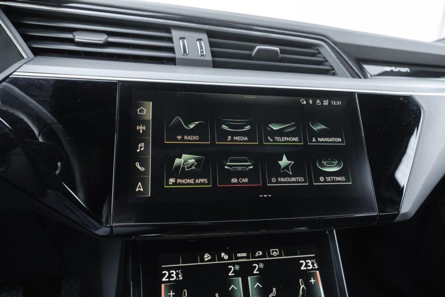 Black Audi E-Tron 2022 in Riga, with an engine capacity of 0.00 L and mileage of 53 thousand km for 33500 €, photo 22 on AUTOMOTO.COM.LV