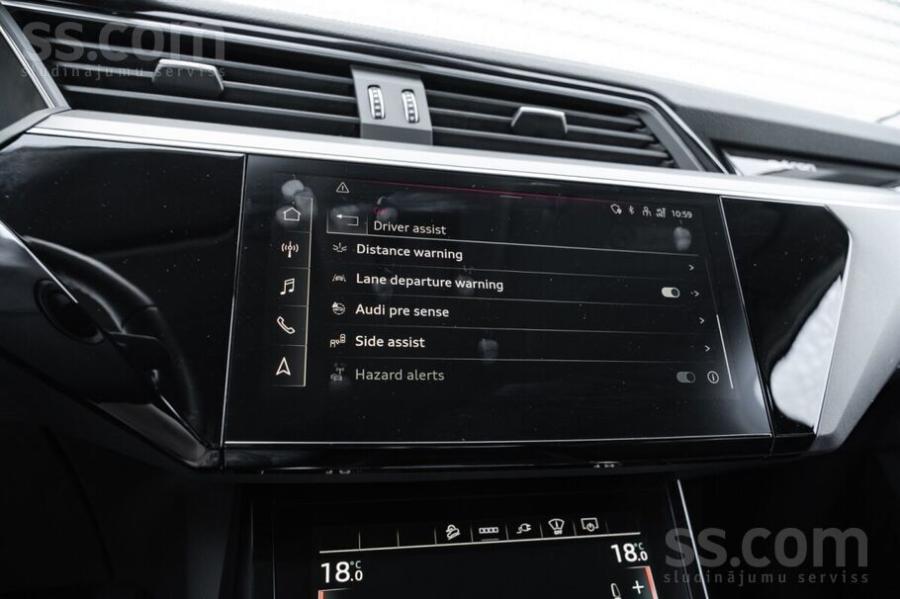 Black Audi E-Tron 2023 in Riga, with an engine capacity of 0.00 L and mileage of 47 thousand km for 38300 €, photo 29 on AUTOMOTO.COM.LV