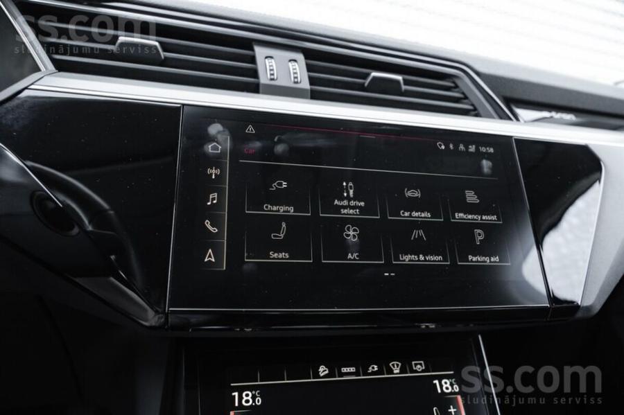 Black Audi E-Tron 2023 in Riga, with an engine capacity of 0.00 L and mileage of 47 thousand km for 38300 €, photo 24 on AUTOMOTO.COM.LV