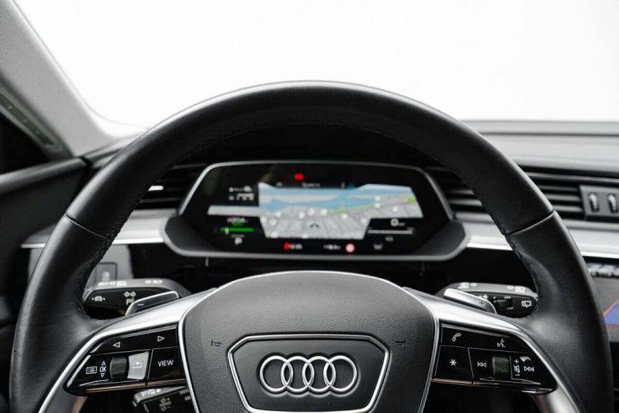 Blue Audi E-Tron 2022 in Riga, with an engine capacity of 0.00 L and mileage of 106 thousand km for 28950 €, photo 19 on AUTOMOTO.COM.LV
