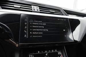 Blue Audi E-Tron 2022 in Riga, with an engine capacity of 0.00 L and mileage of 106 thousand km for 28950 €, photo 31 on AUTOMOTO.COM.LV