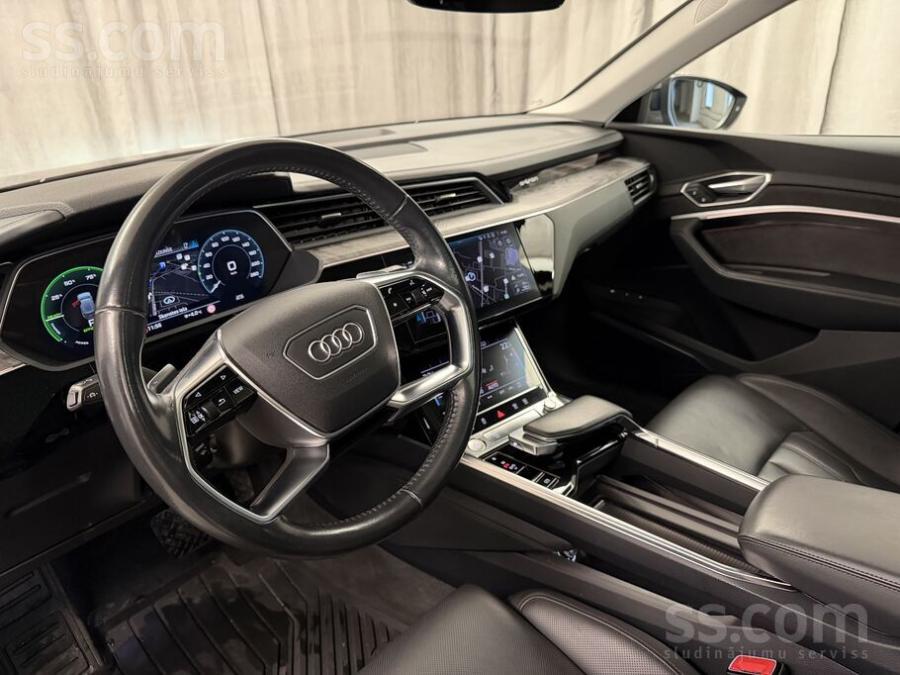 Grey Audi E-Tron 2019 in Riga, with an engine capacity of 0.00 L and mileage of 65 thousand km for 31990 €, photo 8 on AUTOMOTO.COM.LV