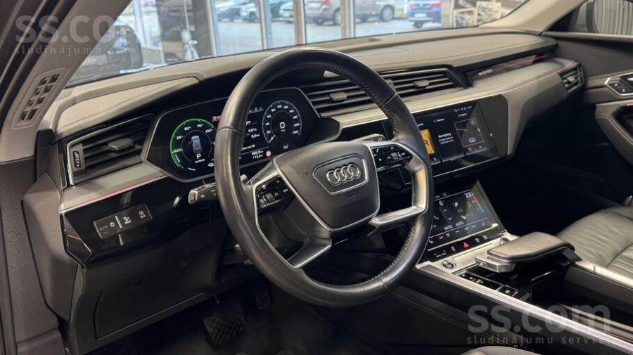 Grey Audi E-Tron 2020 in Riga, with an engine capacity of 0.00 L and mileage of 111 thousand km for 22990 €, photo 19 on AUTOMOTO.COM.LV