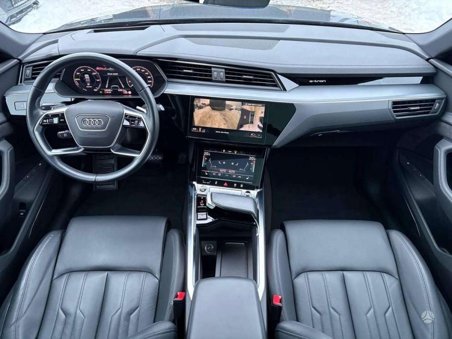 Grey Audi E-Tron 2021 in Vilnius, with an engine capacity of 0.00 L and mileage of 128 thousand km for 31400 €, photo 25 on AUTOMOTO.COM.LV