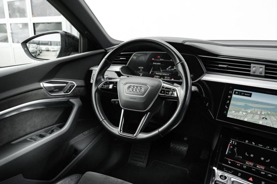 Grey Audi E-Tron 2021 in Riga, with an engine capacity of 0.00 L and mileage of 73 thousand km for 33900 €, photo 36 on AUTOMOTO.COM.LV