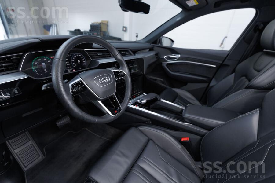 Grey Audi E-Tron 2021 in Riga, with an engine capacity of 0.00 L and mileage of 90 thousand km for 27900 €, photo 21 on AUTOMOTO.COM.LV