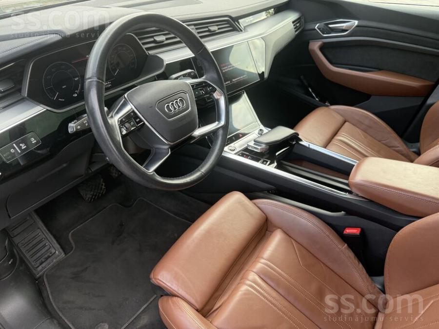 Grey Audi E-Tron 2021 in Riga, with an engine capacity of 0.00 L and mileage of 125 thousand km for 24777 €, photo 16 on AUTOMOTO.COM.LV
