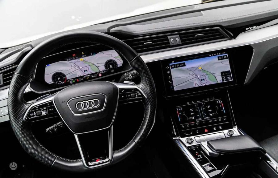 Grey Audi E-Tron 2022 in Vilnius, with an engine capacity of 0.00 L and mileage of 106 thousand km for 32200 €, photo 22 on AUTOMOTO.COM.LV