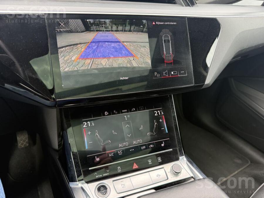 Grey Audi E-Tron 2022 in Riga, with an engine capacity of 0.00 L and mileage of 129 thousand km for 26850 €, photo 27 on AUTOMOTO.COM.LV