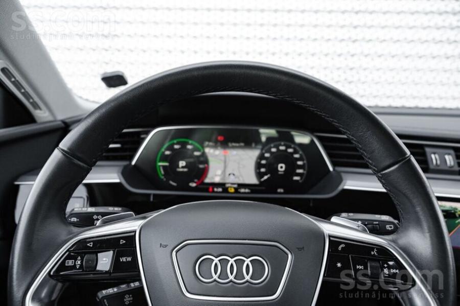 Grey Audi E-Tron 2022 in Riga, with an engine capacity of 0.00 L and mileage of 60 thousand km for 35600 €, photo 17 on AUTOMOTO.COM.LV