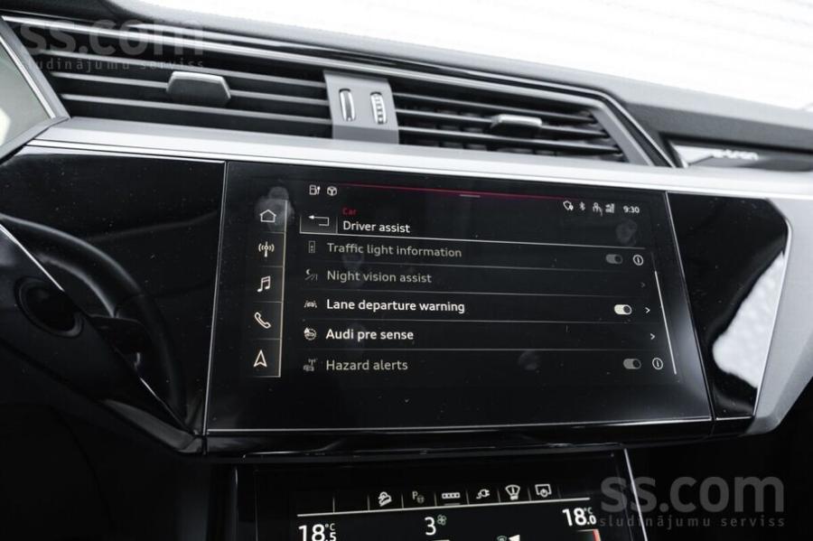 Grey Audi E-Tron 2022 in Riga, with an engine capacity of 0.00 L and mileage of 60 thousand km for 35600 €, photo 23 on AUTOMOTO.COM.LV
