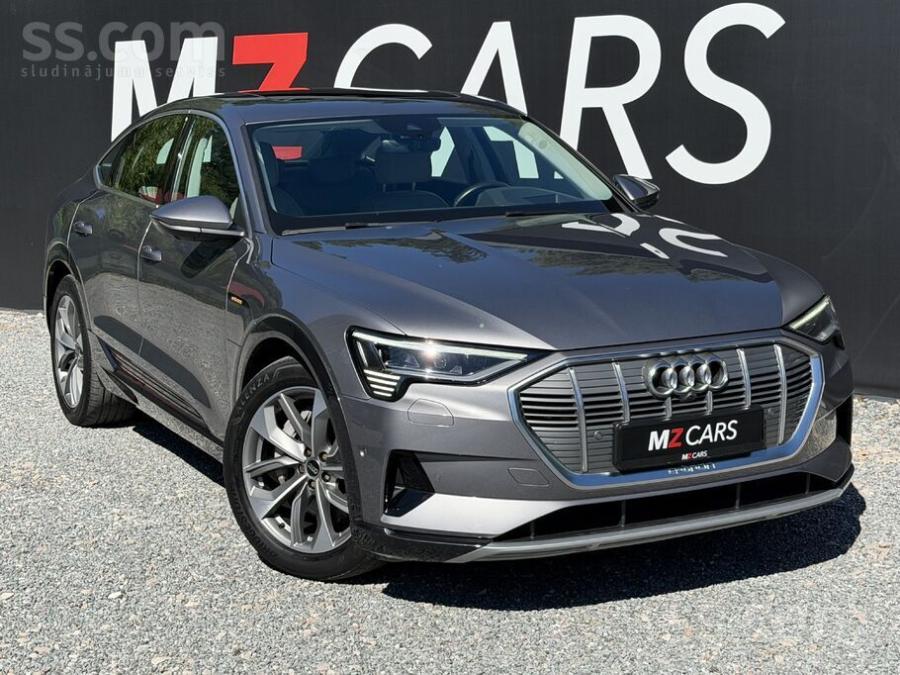 Grey Audi E-Tron 2023 in Riga, with an engine capacity of 0.00 L and mileage of 51 thousand km for 38990 €, photo 1 on AUTOMOTO.COM.LV