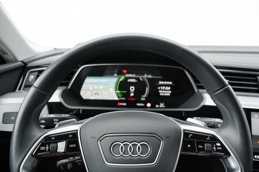 Grey Audi E-Tron 2023 in Riga, with an engine capacity of 0.00 L and mileage of 37 thousand km for 38900 €, photo 22 on AUTOMOTO.COM.LV