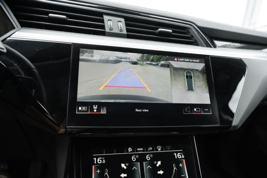 Grey Audi E-Tron 2023 in Riga, with an engine capacity of 0.00 L and mileage of 37 thousand km for 38900 €, photo 37 on AUTOMOTO.COM.LV
