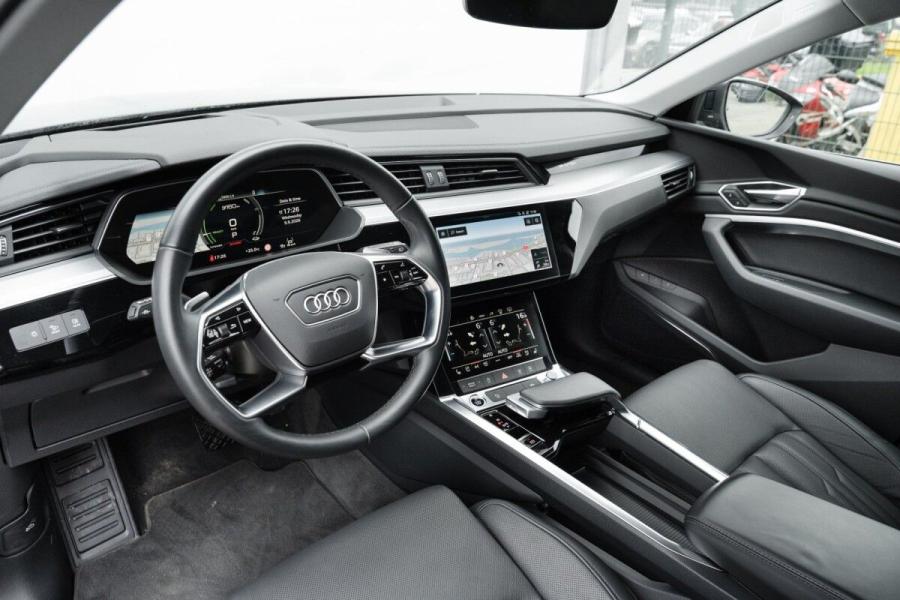 Grey Audi E-Tron 2023 in Riga, with an engine capacity of 0.00 L and mileage of 37 thousand km for 38900 €, photo 39 on AUTOMOTO.COM.LV