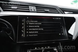 Grey Audi E-Tron 2021 in Riga, with an engine capacity of 0.00 L and mileage of 76 thousand km for 27900 €, photo 28 on AUTOMOTO.COM.LV