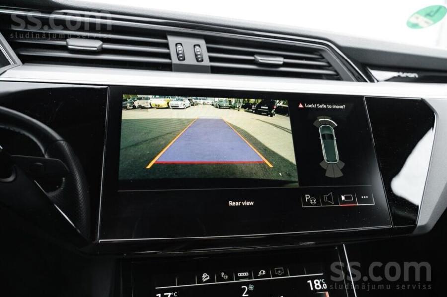 Grey Audi E-Tron 2021 in Riga, with an engine capacity of 0.00 L and mileage of 76 thousand km for 27900 €, photo 31 on AUTOMOTO.COM.LV