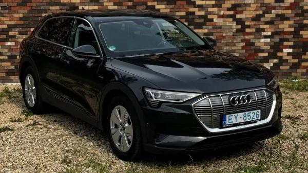 Grey Audi E-Tron 2021 in Riga, with an engine capacity of 0.00 L and mileage of 102 thousand km for 29999 €, photo 1 on AUTOMOTO.COM.LV