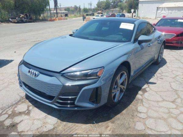 Grey Audi E-tron GT 2024 in Klaipeda, with an engine capacity of 0.00 L and mileage of 16 thousand km for 25000 €, photo 2 on AUTOMOTO.COM.LV