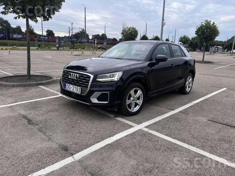 Black Audi Q2 2017 in Riga, with an engine capacity of 1.40 L and mileage of 215 thousand km for 15200 €, photo 1 on AUTOMOTO.COM.LV