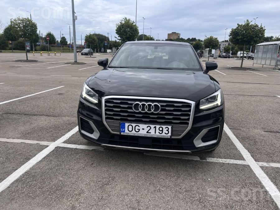 Black Audi Q2 2017 in Riga, with an engine capacity of 1.40 L and mileage of 215 thousand km for 15200 €, photo 4 on AUTOMOTO.COM.LV