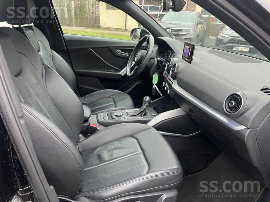 Black Audi Q2 2017 in Riga, with an engine capacity of 1.40 L and mileage of 215 thousand km for 15200 €, photo 7 on AUTOMOTO.COM.LV