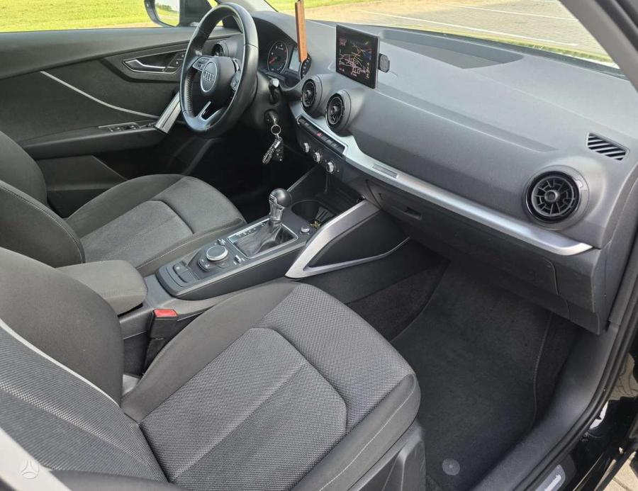Black Audi Q2 2017 in Panevezys, with an engine capacity of 1.60 L and mileage of 232 thousand km for 10999 €, photo 12 on AUTOMOTO.COM.LV