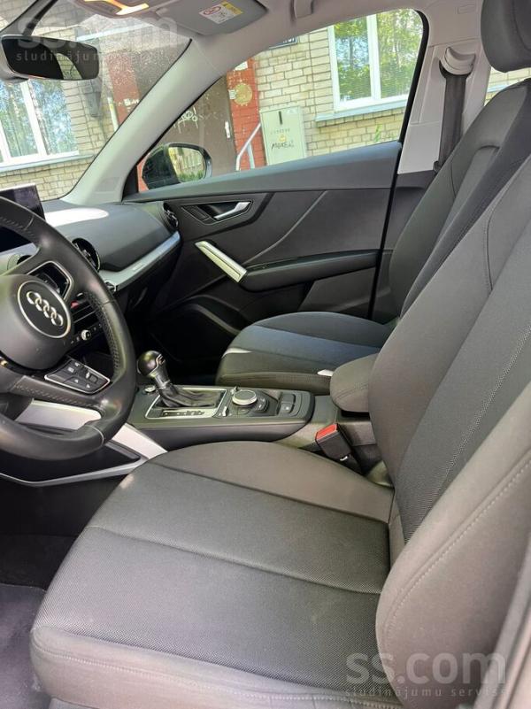 Black Audi Q2 2018 in Riga, with an engine capacity of 1.40 L and mileage of 127 thousand km for 14900 €, photo 7 on AUTOMOTO.COM.LV