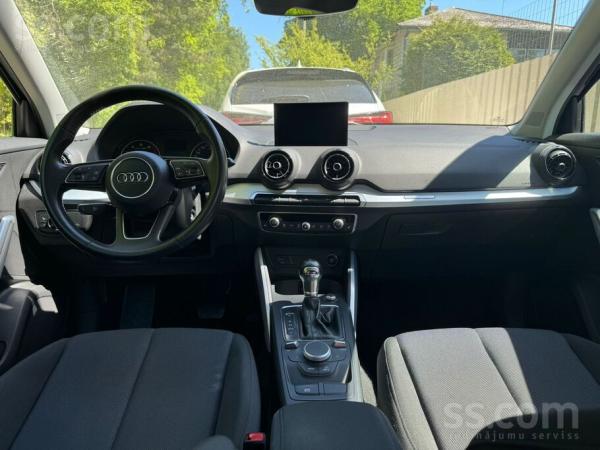 Black Audi Q2 2018 in Riga, with an engine capacity of 1.40 L and mileage of 127 thousand km for 14900 €, photo 10 on AUTOMOTO.COM.LV