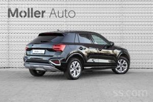 Black Audi Q2 2021 in Riga, with an engine capacity of 1.50 L and mileage of 109 thousand km for 21300 €, photo 4 on AUTOMOTO.COM.LV