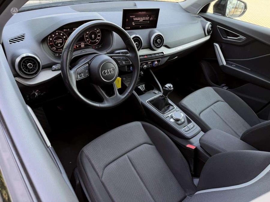 Black Audi Q2 2021 in Kaunas, with an engine capacity of 1.00 L and mileage of 183 thousand km for 14400 €, photo 6 on AUTOMOTO.COM.LV