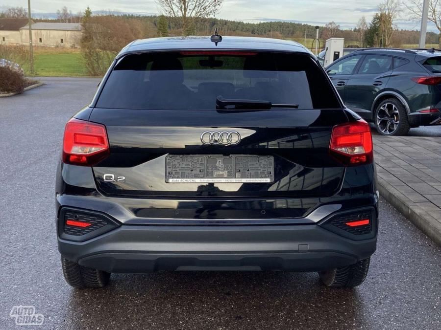 Black Audi Q2 2022 in Kaunas, with an engine capacity of 1.50 L and mileage of 46 thousand km for 24692 €, photo 4 on AUTOMOTO.COM.LV