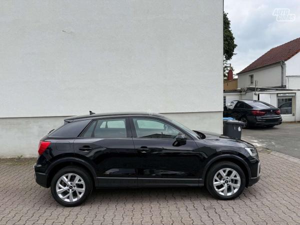 Black Audi Q2 2022 in Kaunas, with an engine capacity of 1.50 L and mileage of 83 thousand km for 23475 €, photo 5 on AUTOMOTO.COM.LV