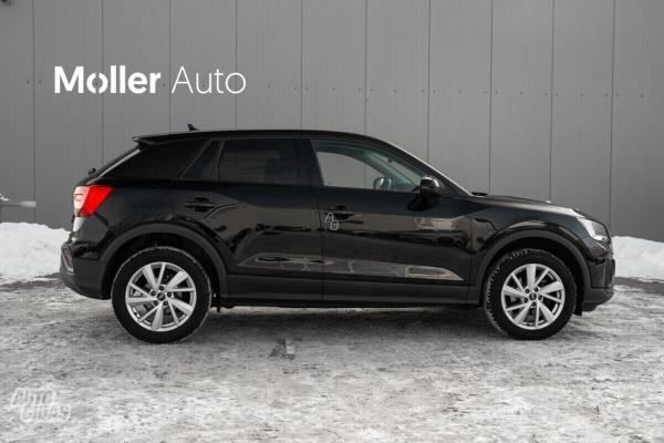 Black Audi Q2 2022 in Vilnius, with an engine capacity of 1.50 L and mileage of 100 thousand km for 24050 €, photo 7 on AUTOMOTO.COM.LV
