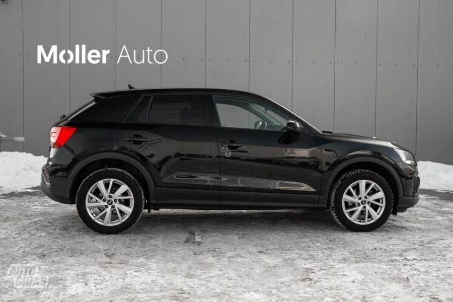 Black Audi Q2 2022 in Vilnius, with an engine capacity of 1.50 L and mileage of 100 thousand km for 24050 €, photo 7 on AUTOMOTO.COM.LV