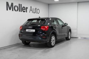 Black Audi Q2 2022 in Vilnius, with an engine capacity of 1.50 L and mileage of 100 thousand km for 22900 €, photo 4 on AUTOMOTO.COM.LV
