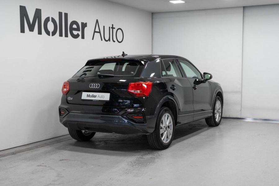 Black Audi Q2 2022 in Vilnius, with an engine capacity of 1.50 L and mileage of 100 thousand km for 22900 €, photo 4 on AUTOMOTO.COM.LV