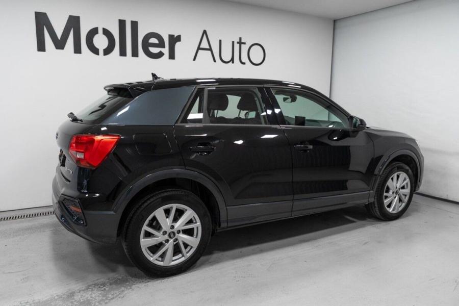 Black Audi Q2 2022 in Vilnius, with an engine capacity of 1.50 L and mileage of 100 thousand km for 22900 €, photo 5 on AUTOMOTO.COM.LV