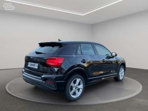 Black Audi Q2 2023 in Kaunas, with an engine capacity of 1.50 L and mileage of 37 thousand km for 30527 €, photo 3 on AUTOMOTO.COM.LV
