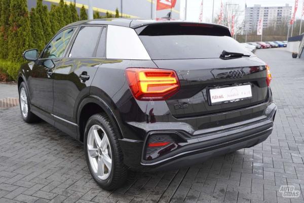 Black Audi Q2 2023 in Kaunas, with an engine capacity of 1.50 L and mileage of 98 thousand km for 27437 €, photo 3 on AUTOMOTO.COM.LV