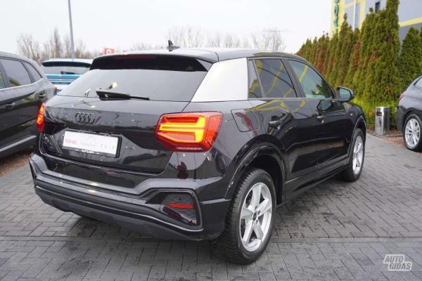 Black Audi Q2 2023 in Kaunas, with an engine capacity of 1.50 L and mileage of 98 thousand km for 27437 €, photo 4 on AUTOMOTO.COM.LV