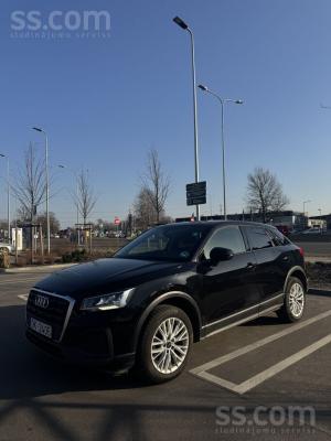 Black Audi Q2 2023 in Riga, with an engine capacity of 1.50 L and mileage of 41 thousand km for 20700 €, photo  on AUTOMOTO.COM.LV